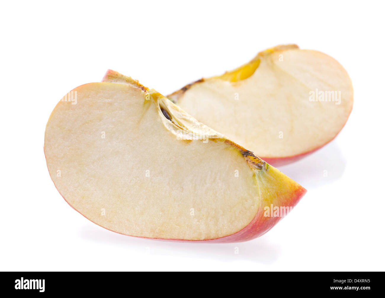 Apple part closeup isolated on white Stock Photo - Alamy