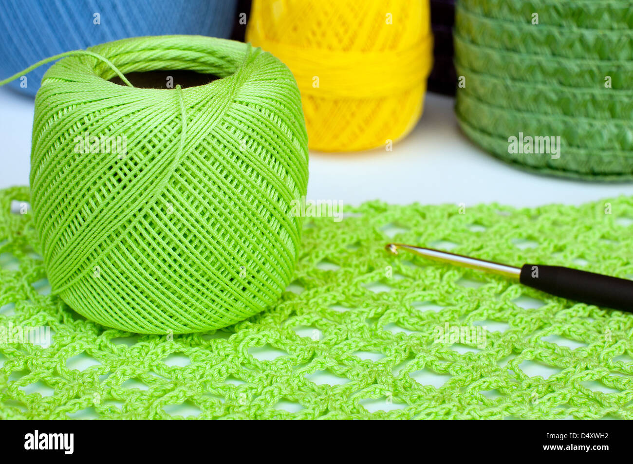 Green crochet sample with yarn and hook Stock Photo - Alamy