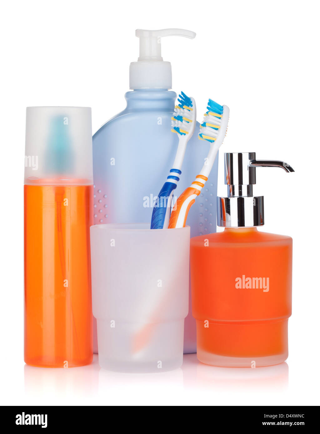 Cosmetics bottles, toothbrushes and liquid soap. Isolated on white ...