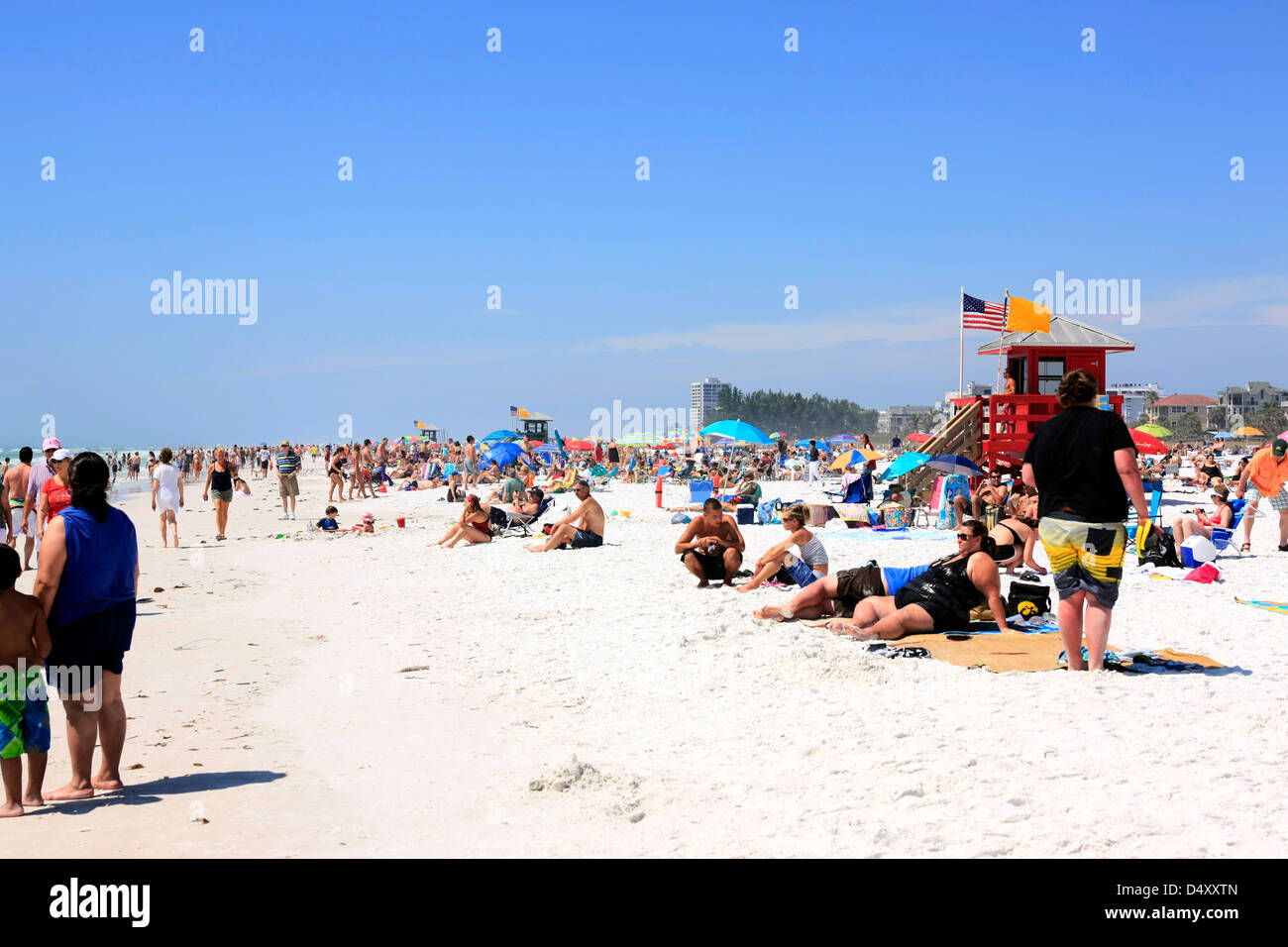 People enjoying the sunshine on Siesta Key beach Florida during Spring ...