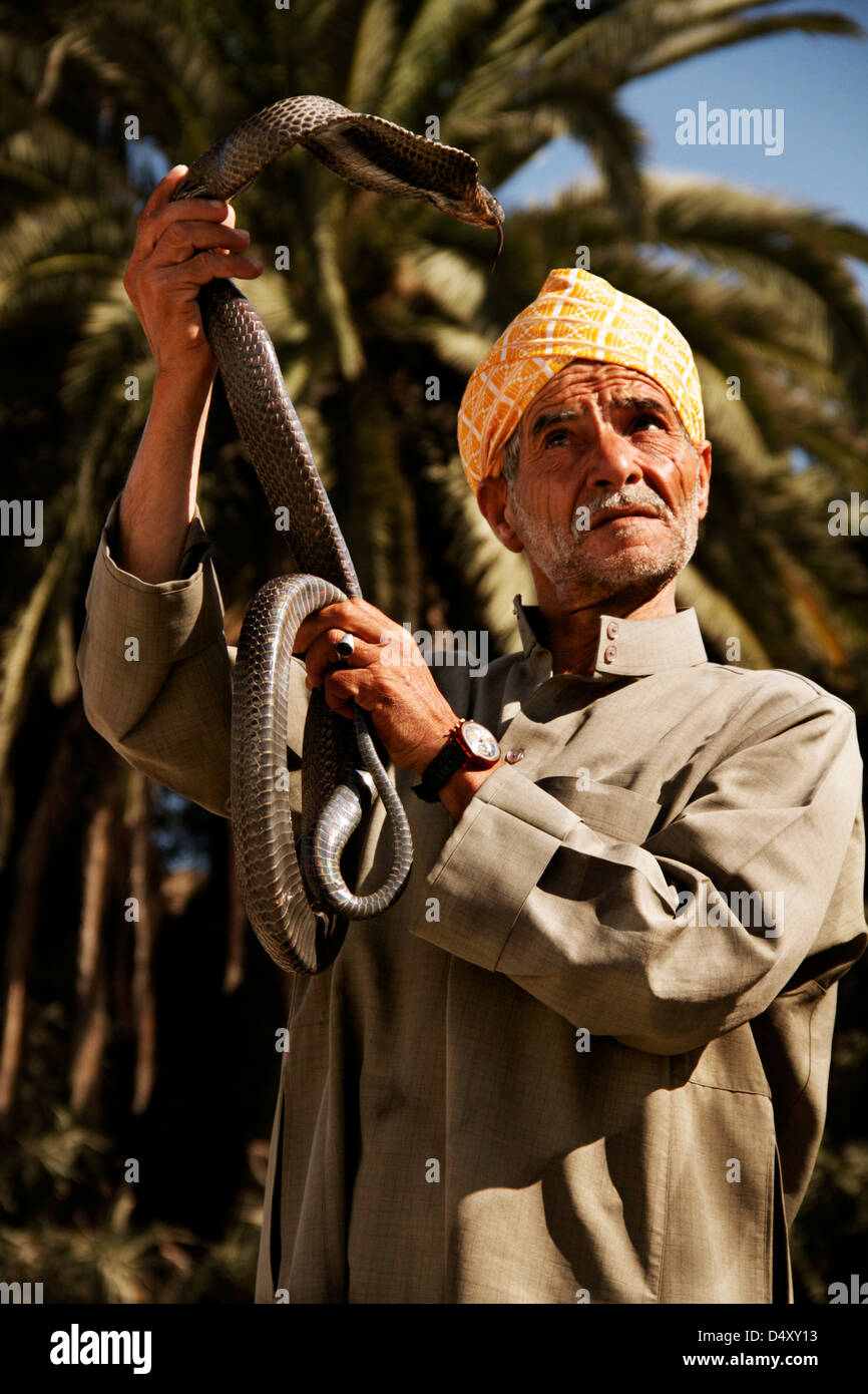 People with snake hi-res stock photography and images - Alamy