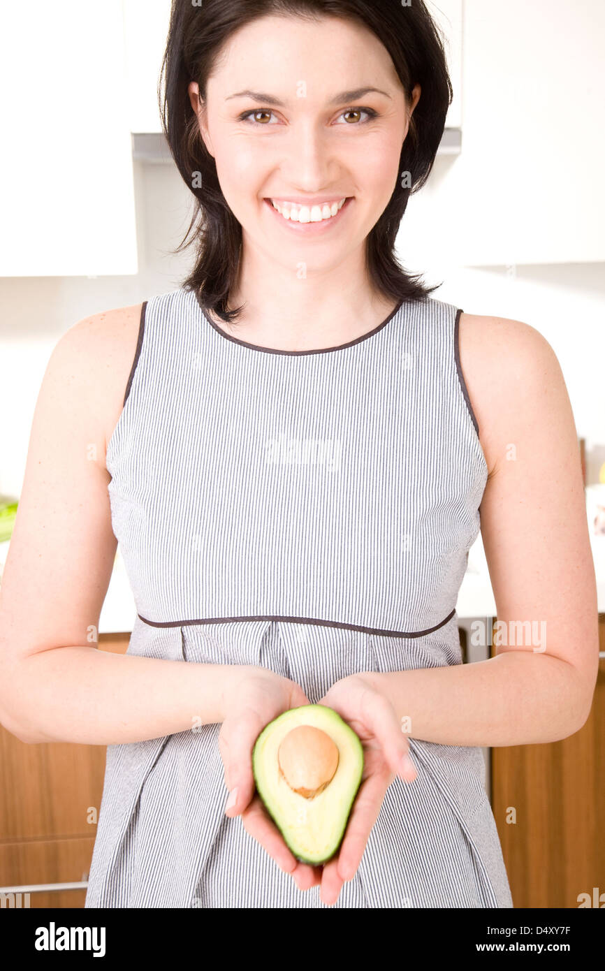 Woman and avocado hi-res stock photography and images - Alamy