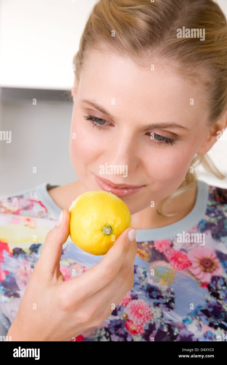 Woman with lemon Stock Photo - Alamy