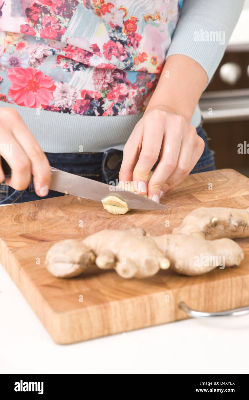 Woman holding ginger root hi-res stock photography and images - Alamy