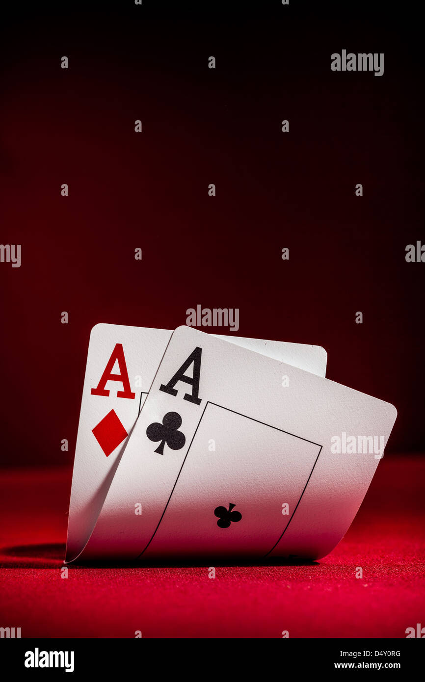 Pockets Aces with plenty of red background for textcopy Stock Photo - Alamy