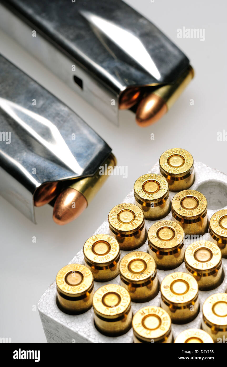 Loaded 9 mm/16 rounds semi-automatic magazines or clips with box of ...