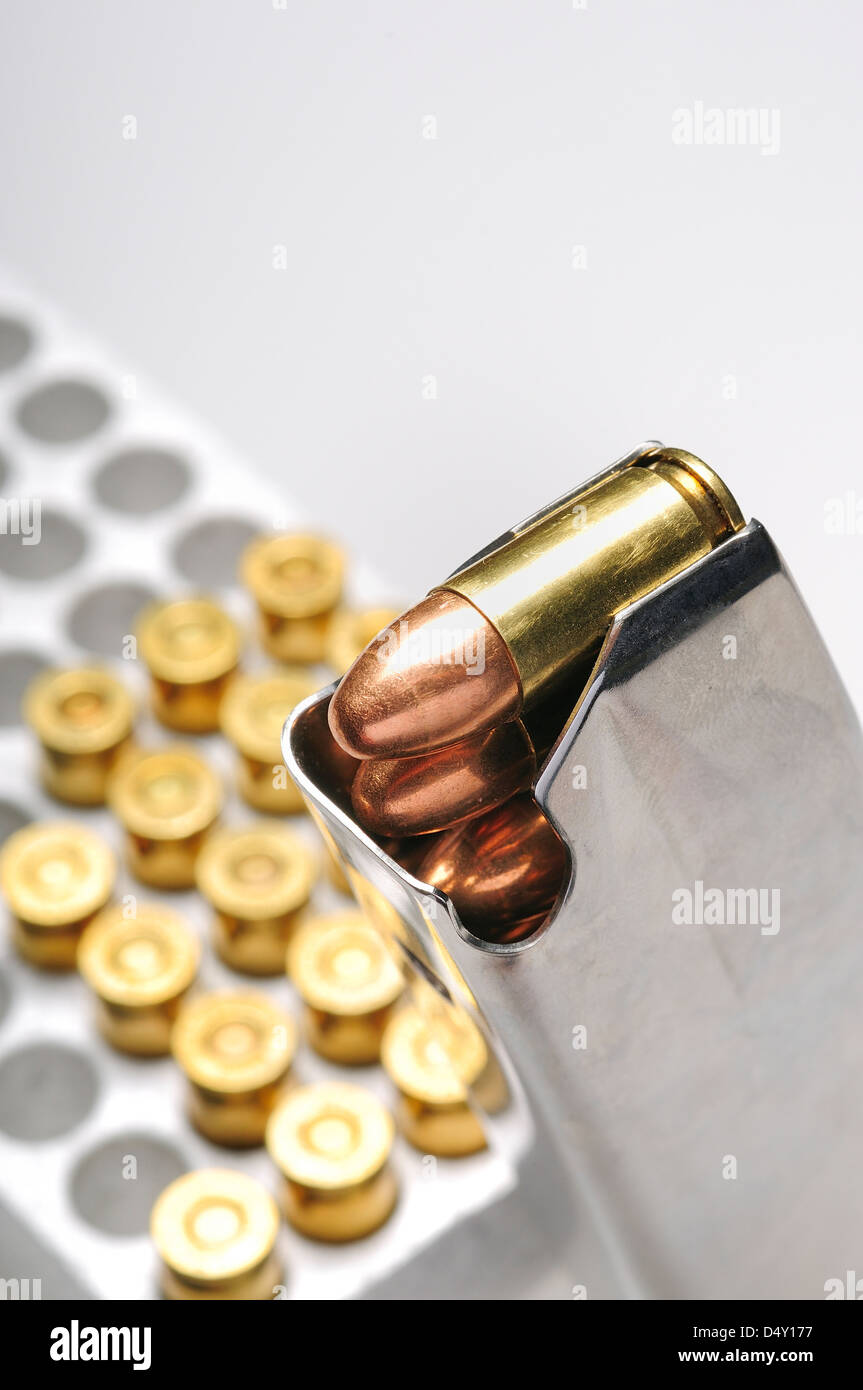 Loaded 9 mm/16 rounds semi-automatic magazine or clip with box of ...