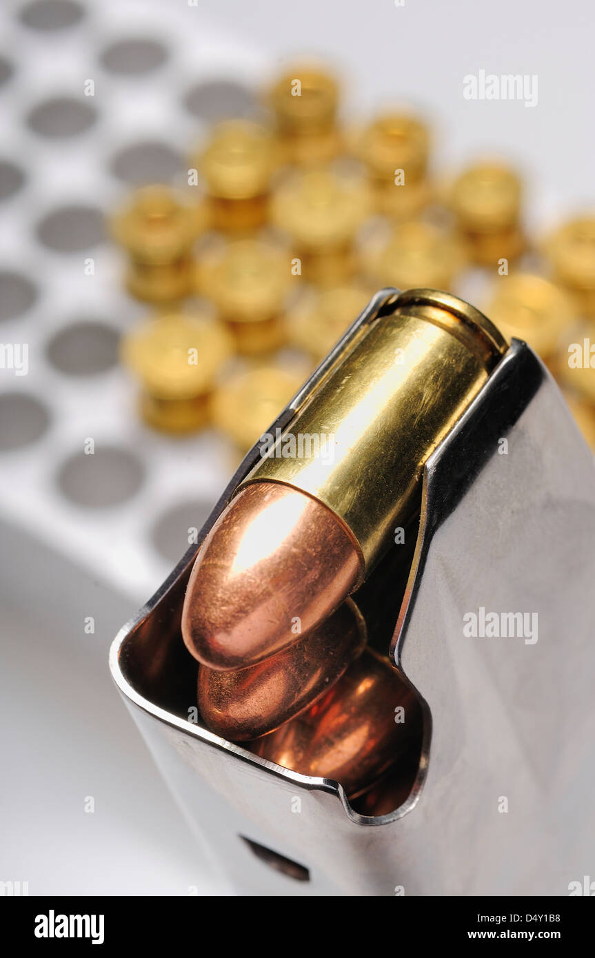 Loaded 9 mm/16 rounds semi-automatic magazine or clip with box of ...