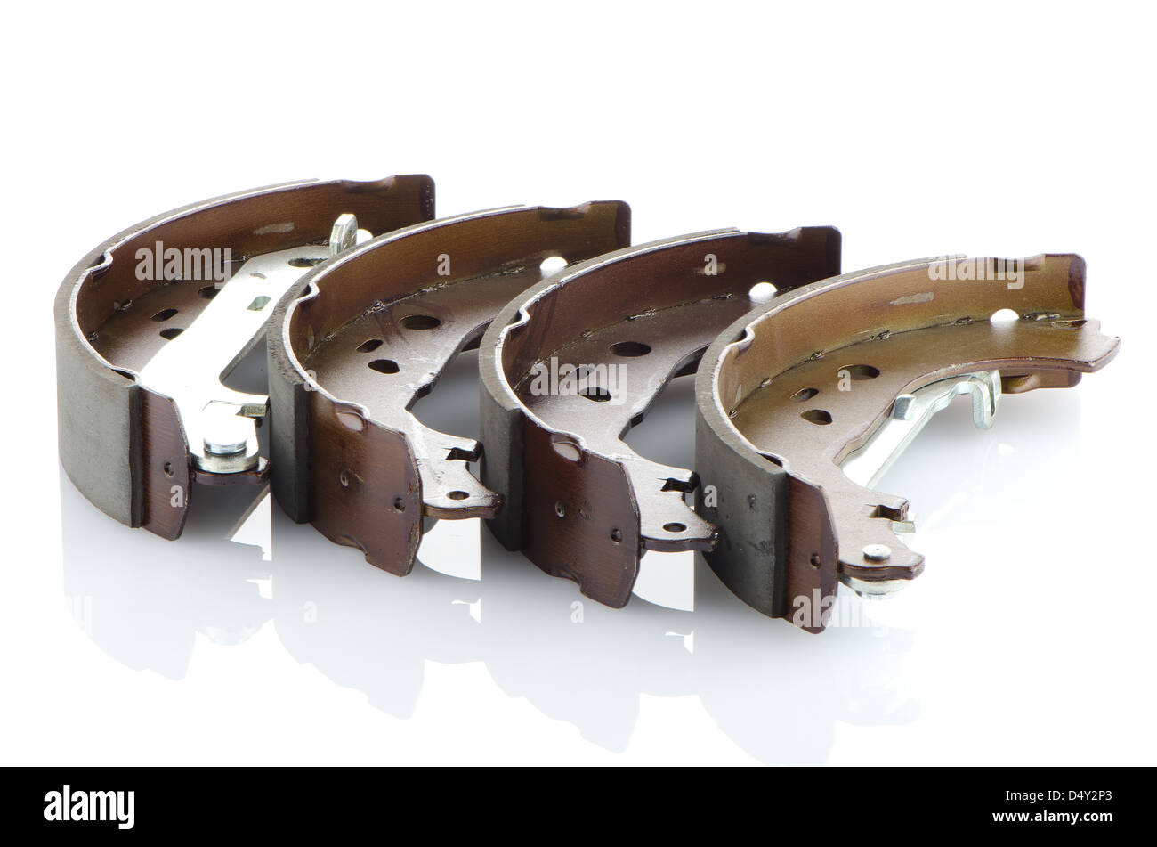 Car brake pads on white reflective background Stock Photo - Alamy