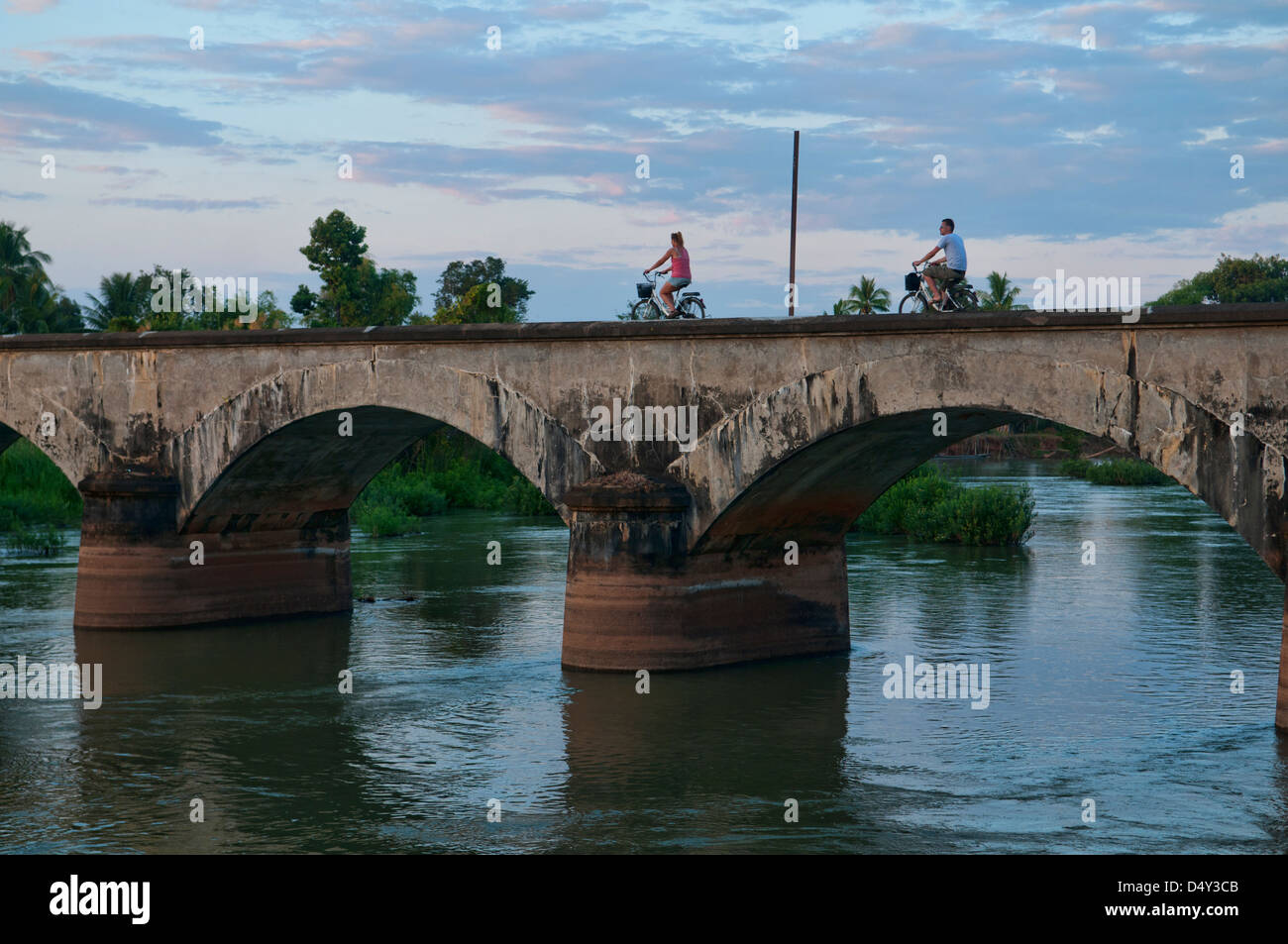 The old French Railway Bridge between Khone and Det islands in the ...