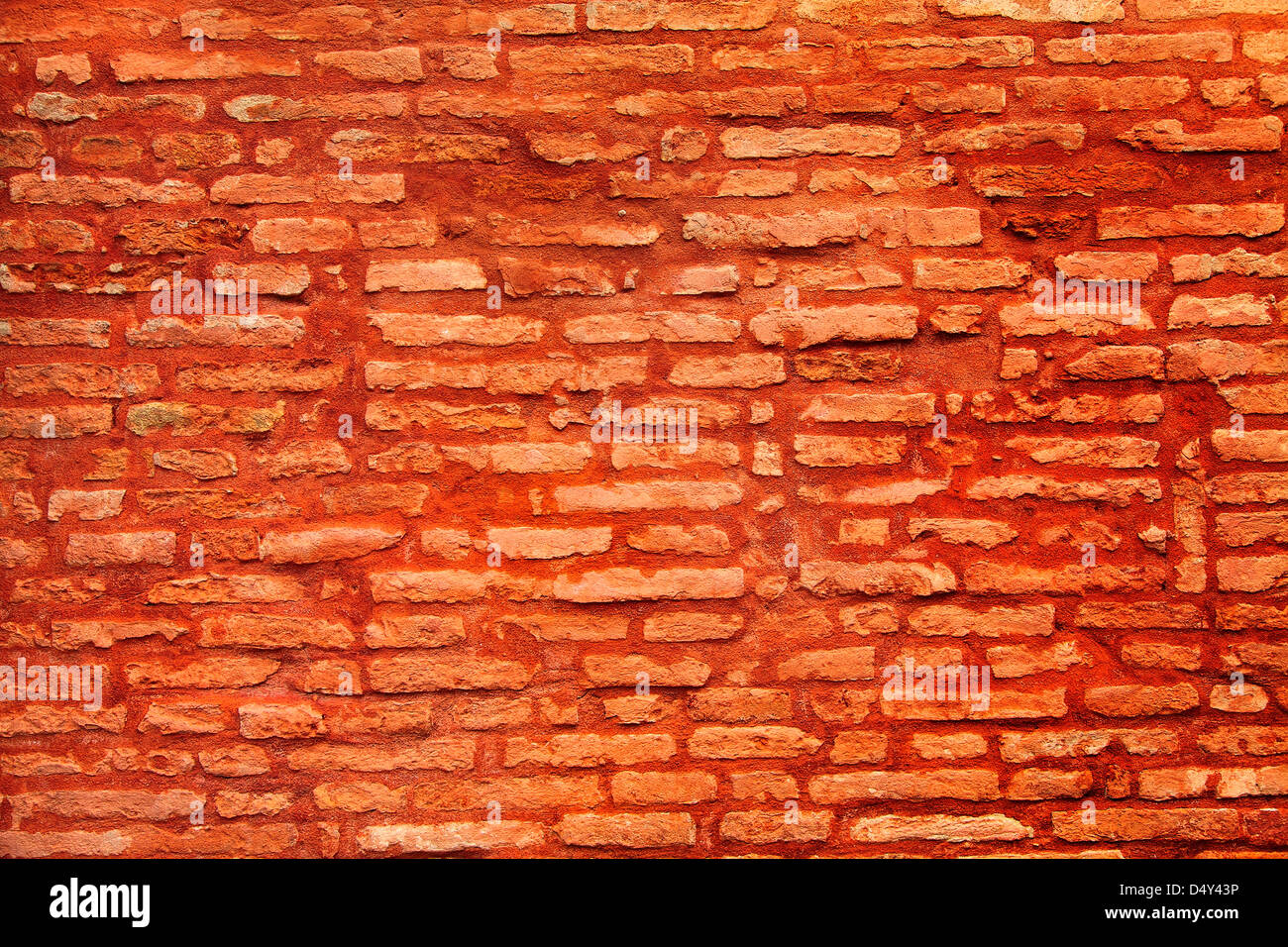 The weather worn red brick wall texture Stock Photo - Alamy