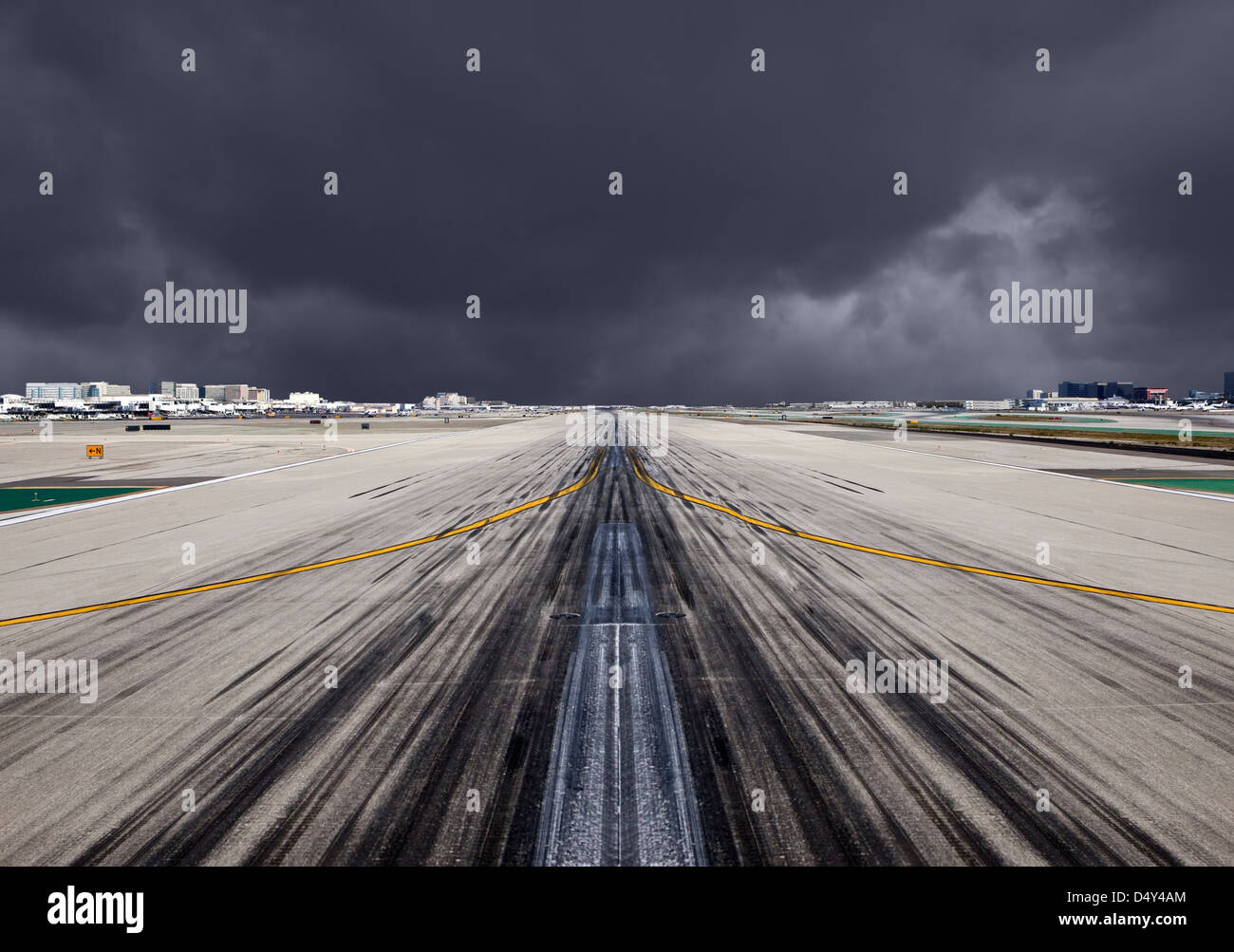 Lax Runway with severe storm clouds Stock Photo - Alamy