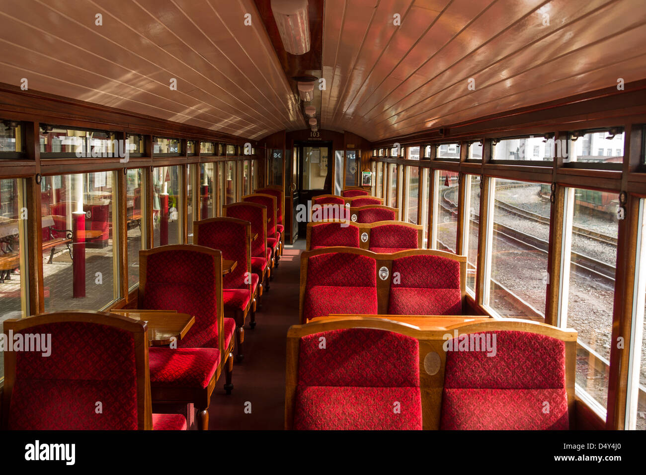 Interior of restored Festiniog railway carriage in Porthmadog station ...