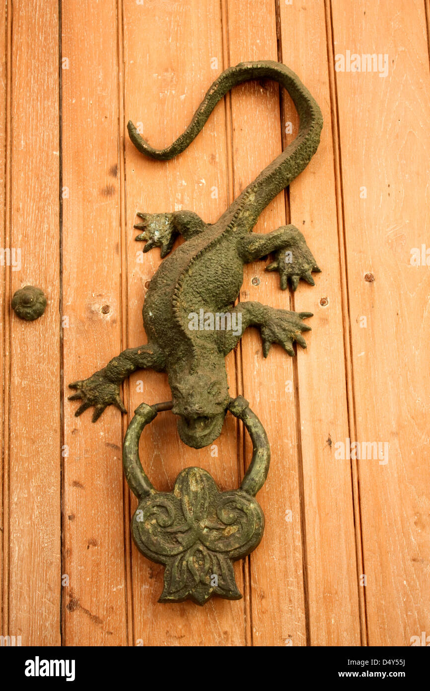 Metal knocker shaped dragon or lizard. Spanish colonial style door ...