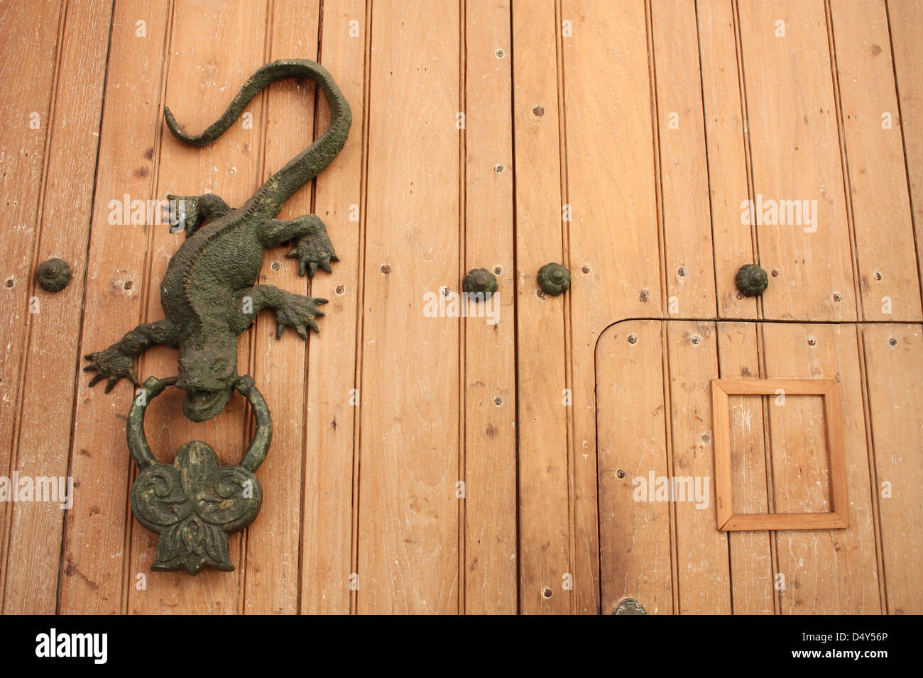 Metal knocker shaped dragon or lizard. Spanish colonial style door ...