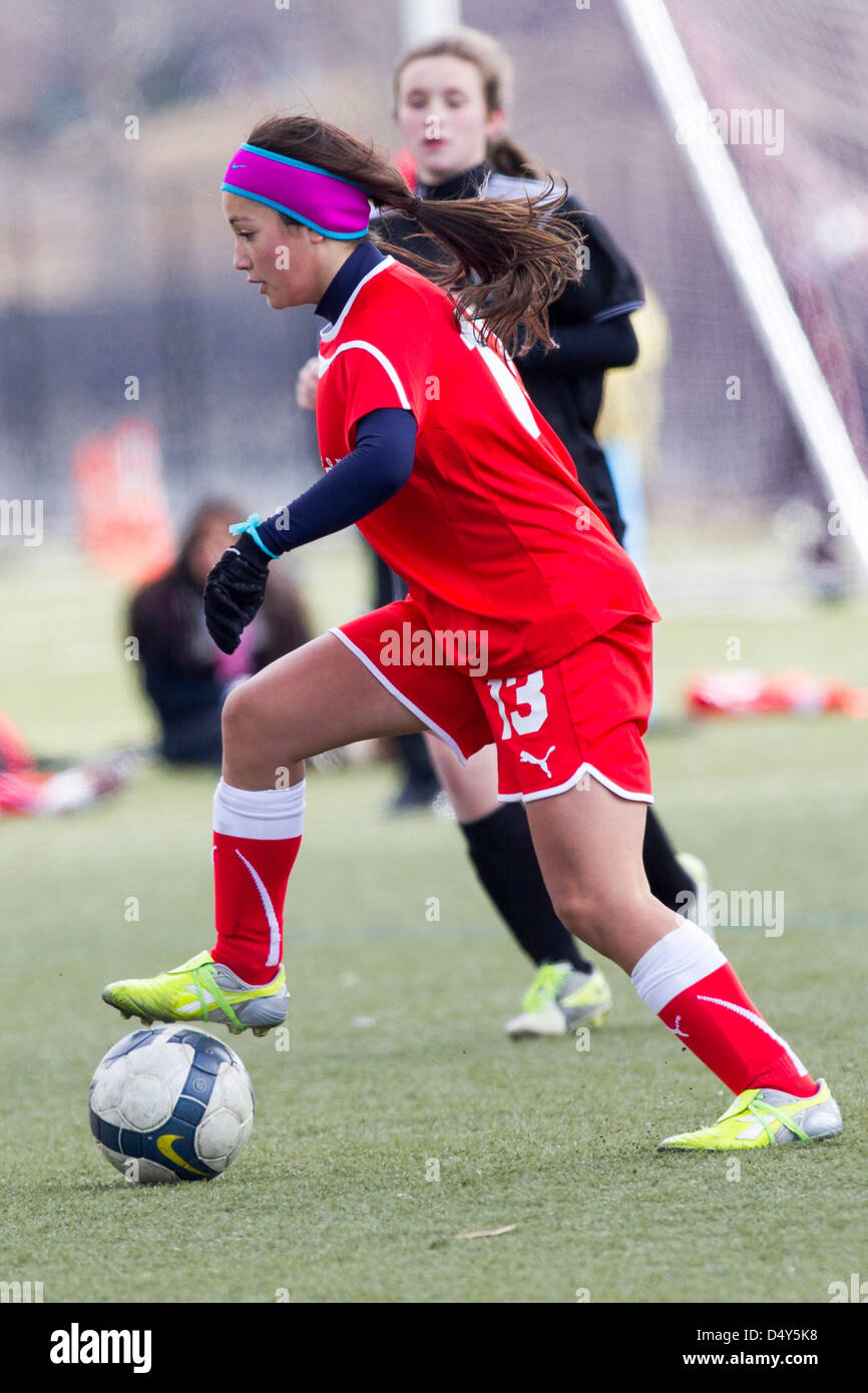 Teen girls soccer action Stock Photo - Alamy