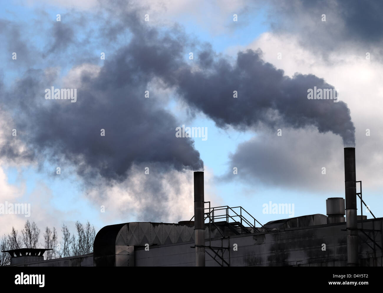 Dark smoke from a smokestack Stock Photo - Alamy
