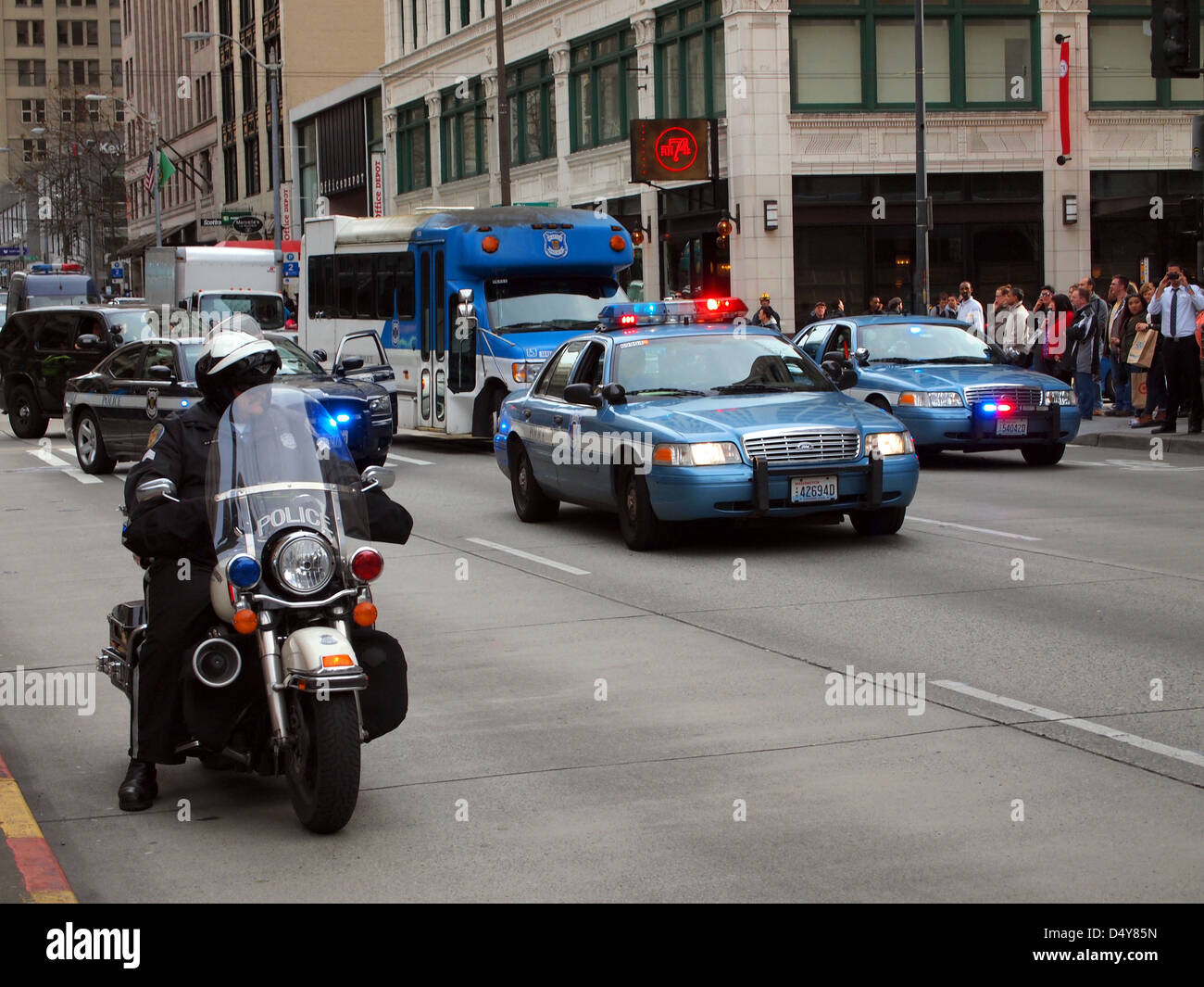 Seattle Police Department vehcile and officers at an Anti police ...