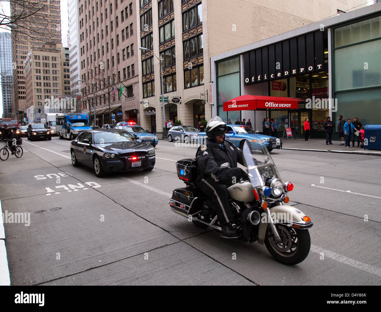Seattle Police Department vehciles and officers at an Anti police ...