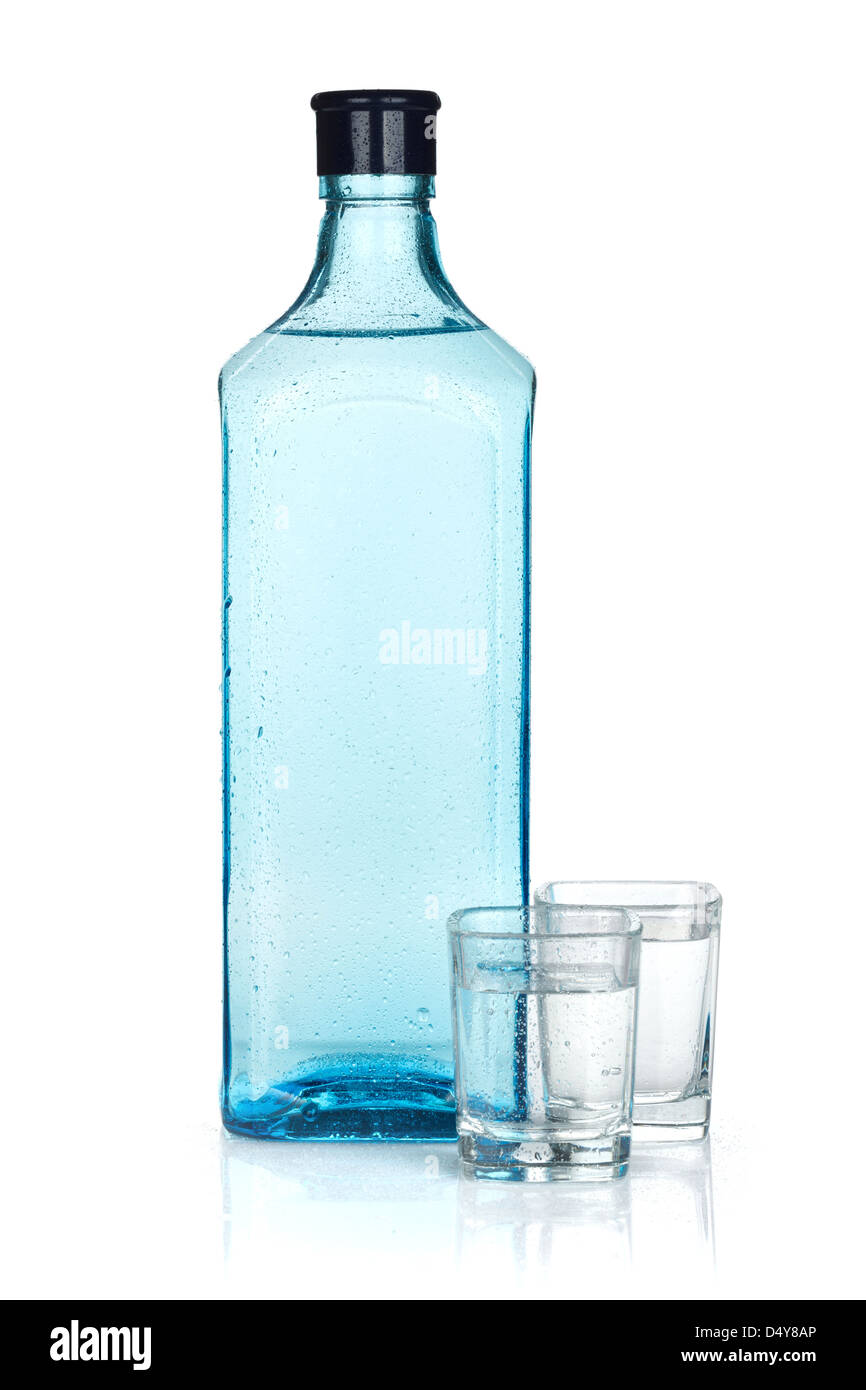 Gin bottle and two shots. Isolated on white background Stock Photo - Alamy