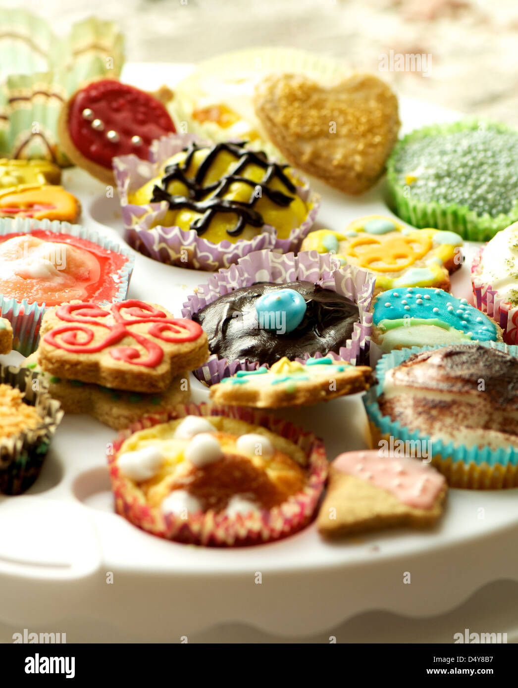 Group of handmade cupcakes and biscuits shot close-up Stock Photo - Alamy