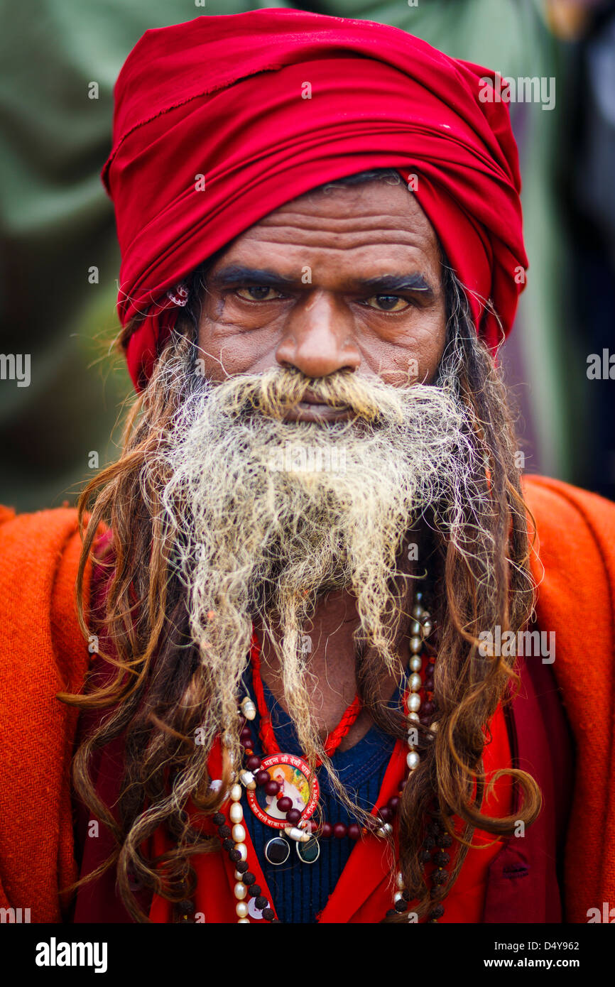 Portrait of a Sadhu with a huge beard at the Kumbh Meal festival 2013 ...