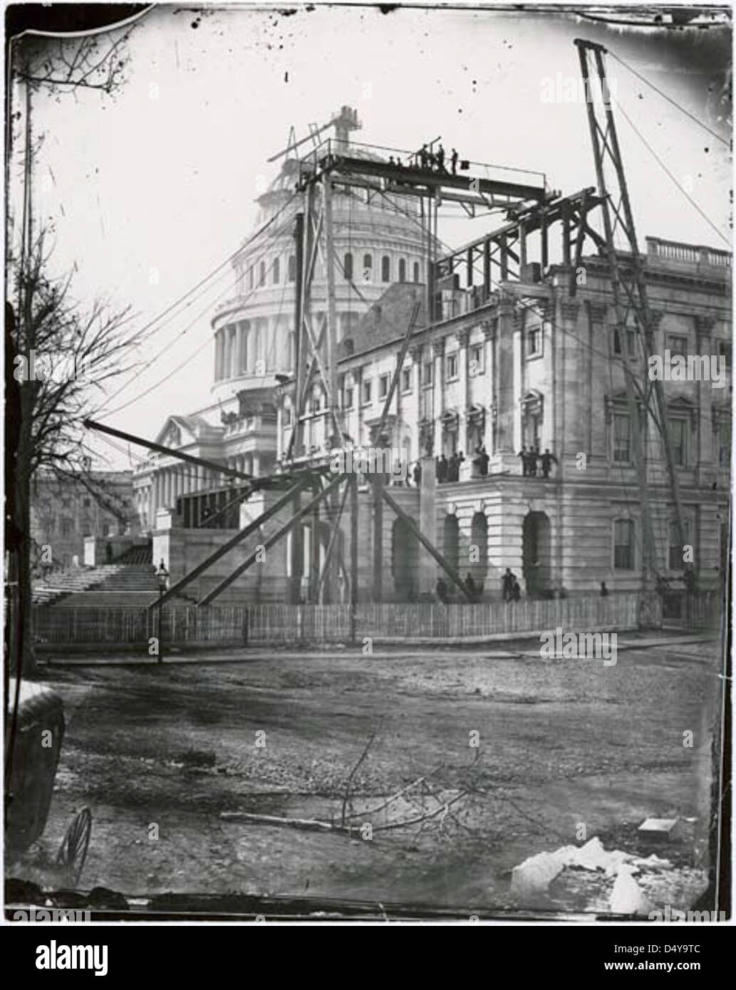 A photograph captures the Capitol Building under construction in ...