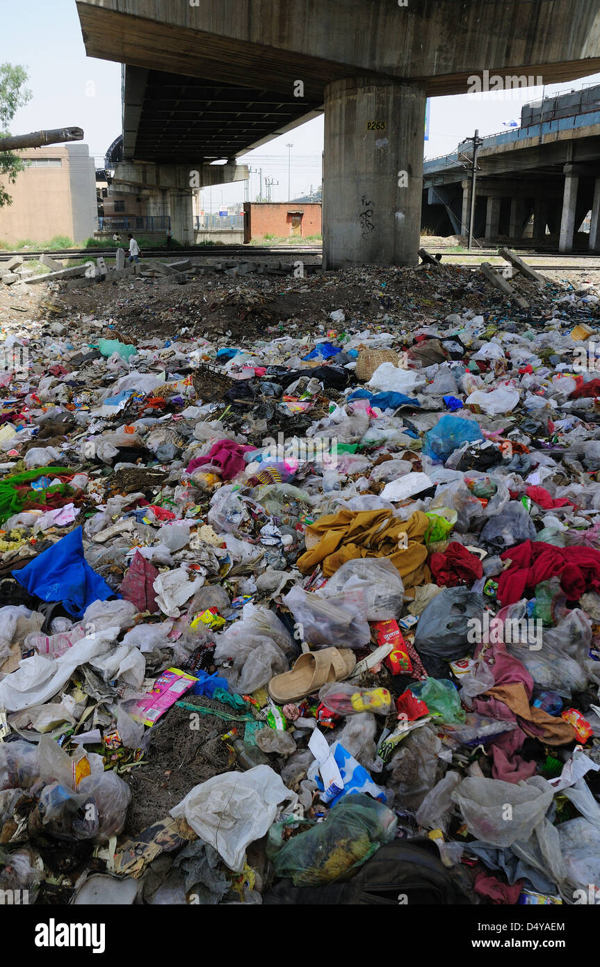 Rubbish around slum area Stock Photo - Alamy