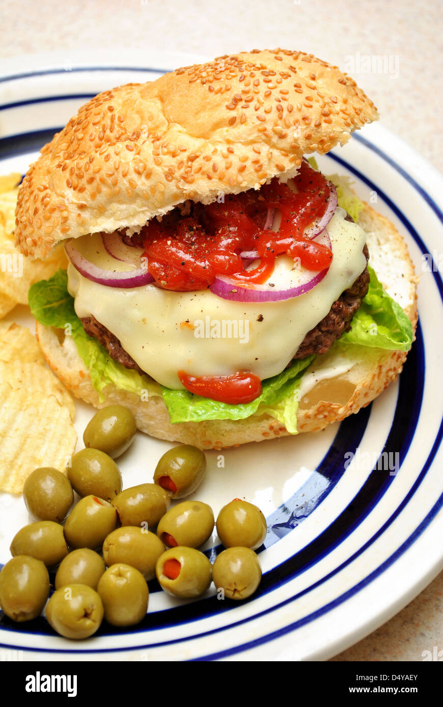 Burger with Condiments Stock Photo - Alamy