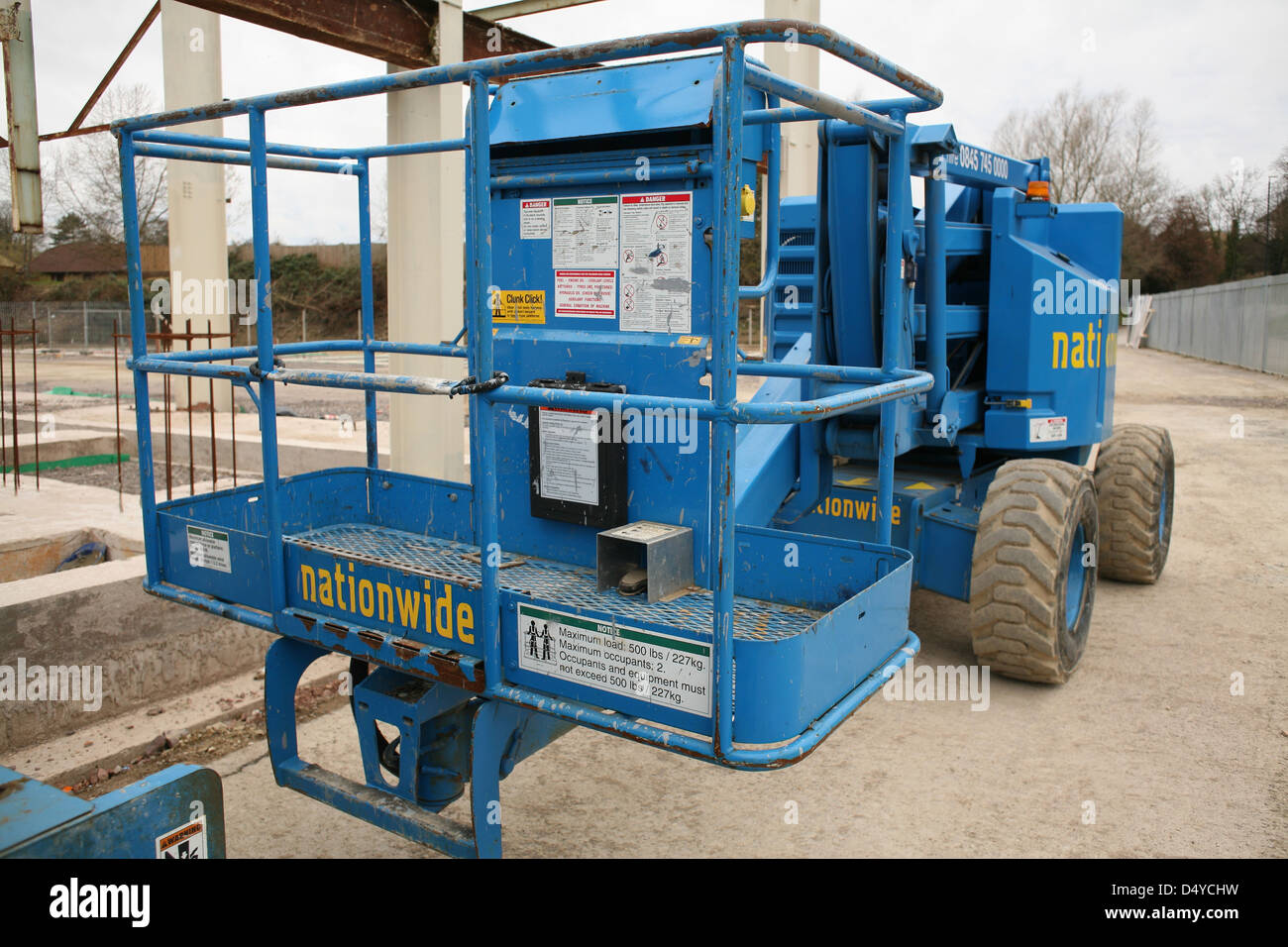 Mobile elevating working platforms MEWP on a building site in ...