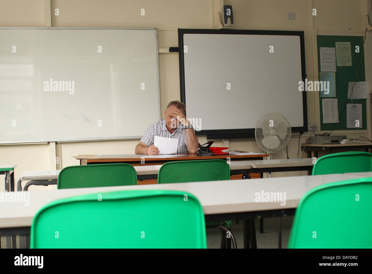 Stressed teacher hi-res stock photography and images - Alamy