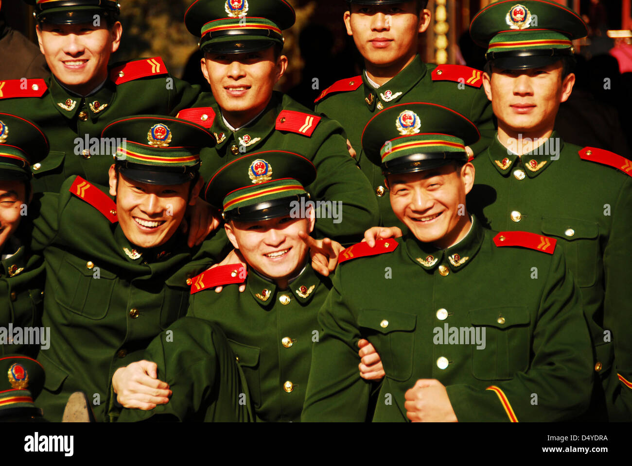 China, Beijing, group of cheerful guards standing together for a photo ...