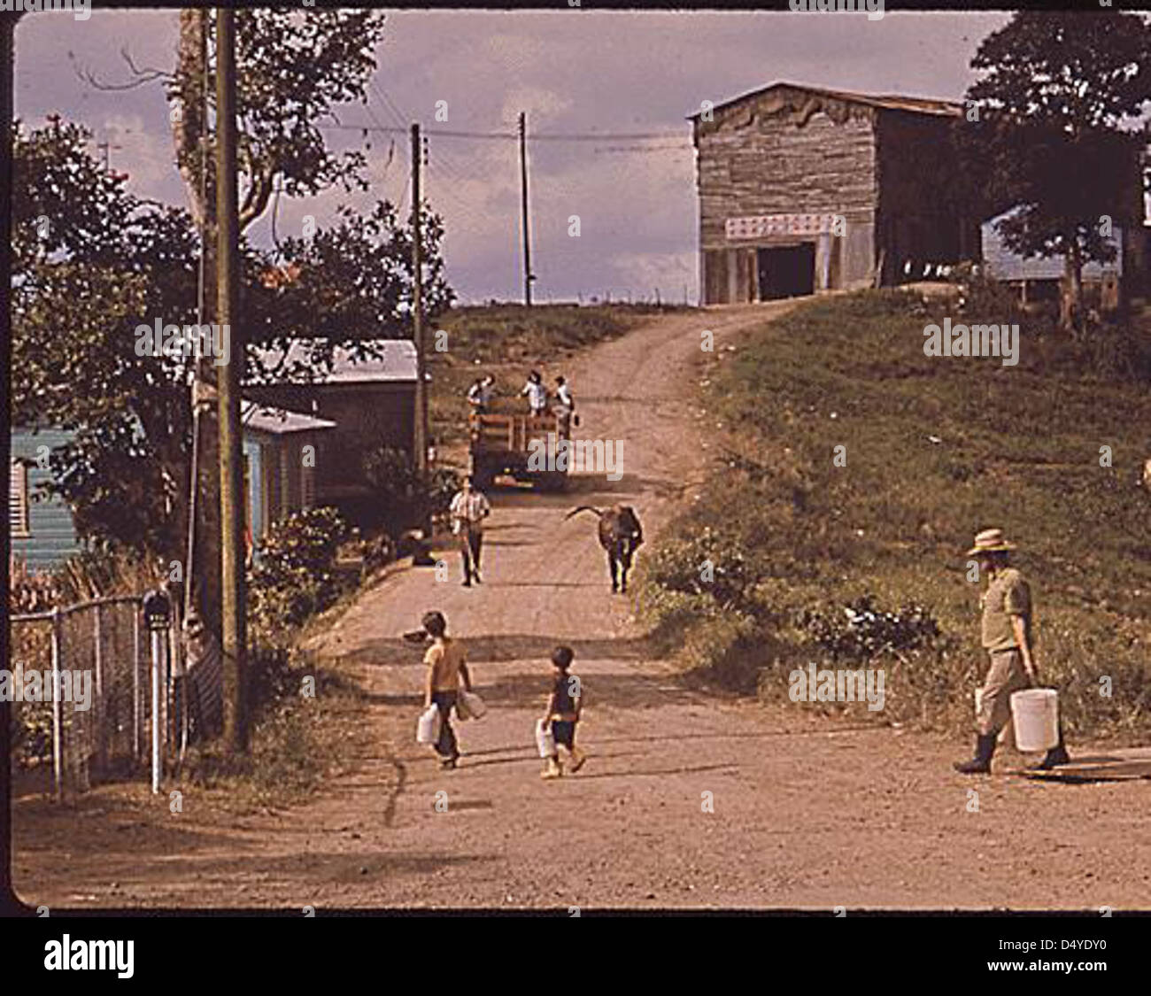 A photograph from February 1973 showing a mountain farm. The image ...