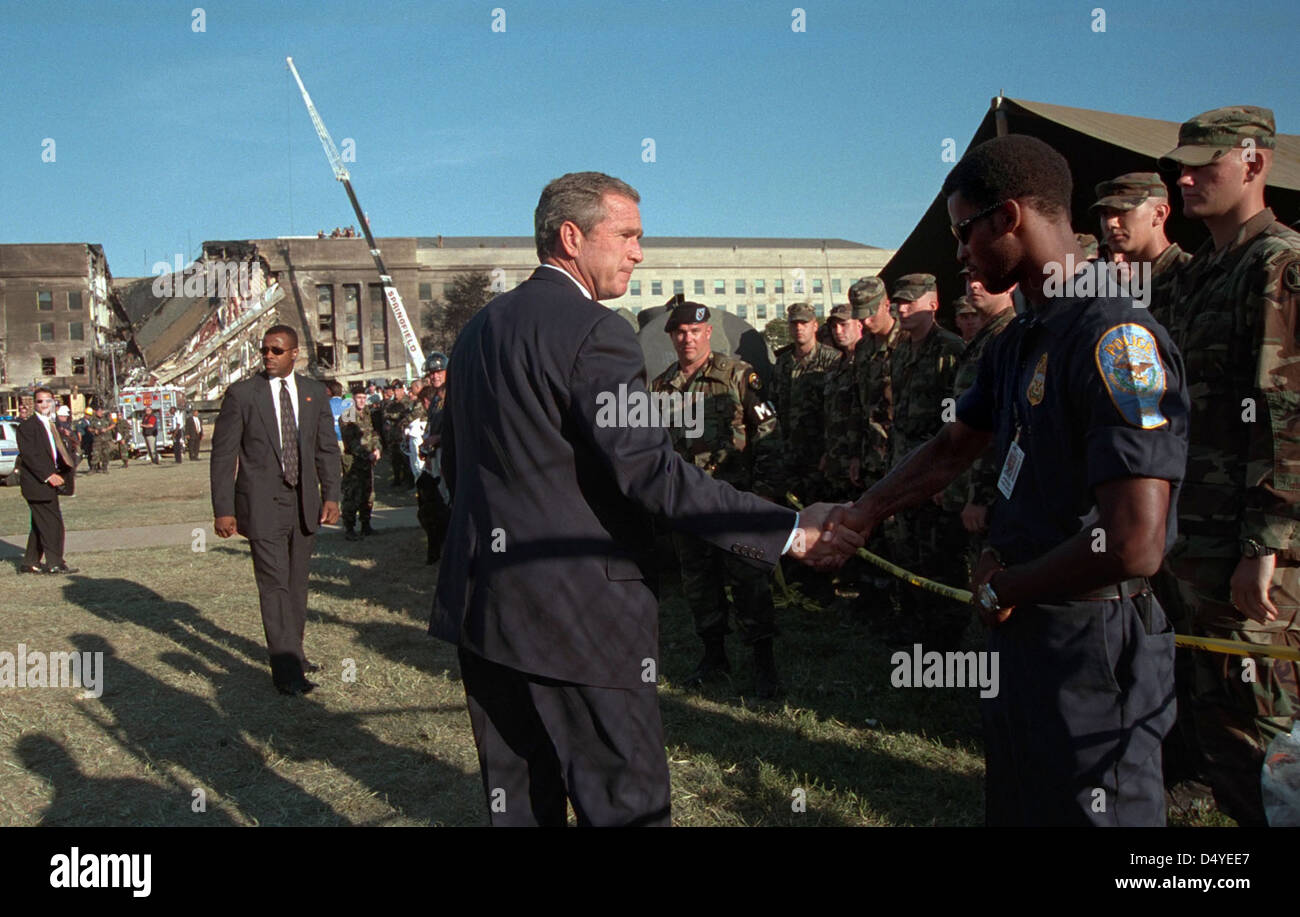 President George W. Bush greets rescue workers, firefighters and ...