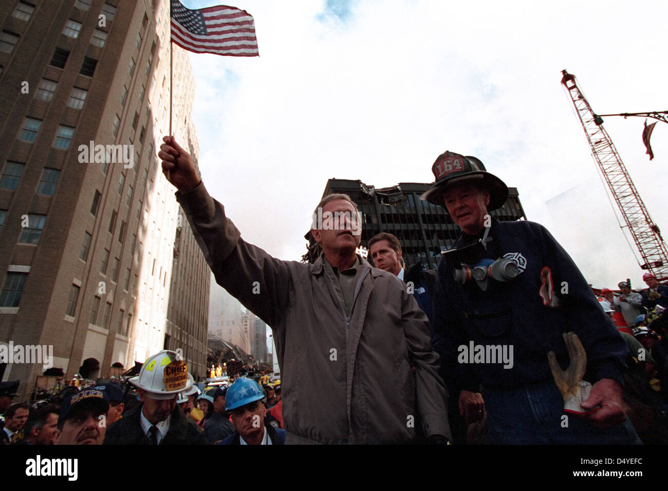 Standing atop rubble with retired New York City firefighter Bob ...