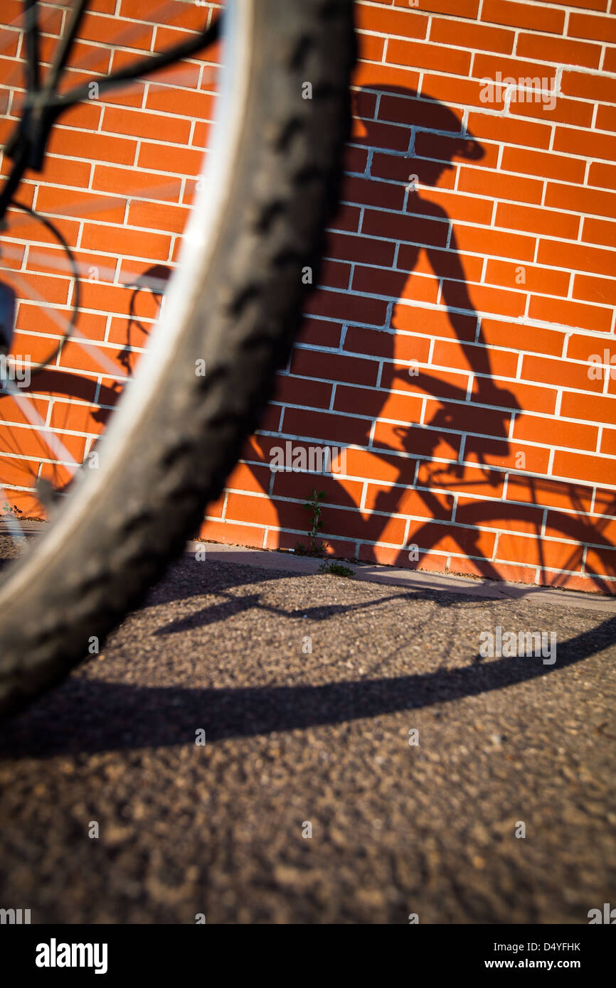 Female biker!s shadow Stock Photo - Alamy
