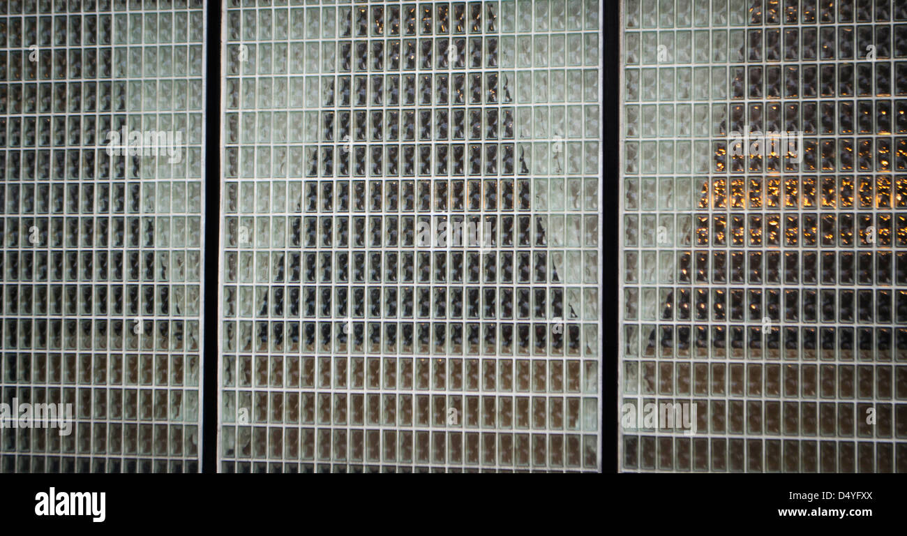 curtains through glass block wall Stock Photo - Alamy