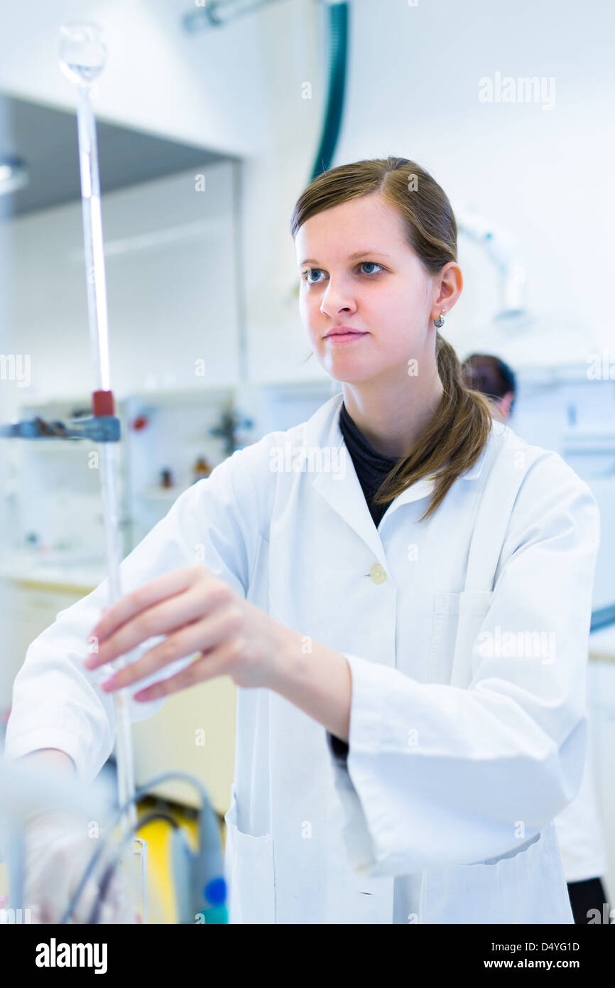 Portrait of a female researcher carrying out research in a chemistry ...