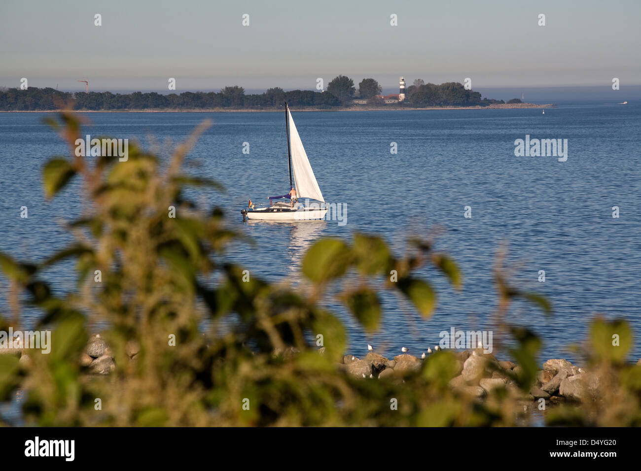 Kiel, Germany, a sail boat off the pier of the Olympic marina Schilksee ...