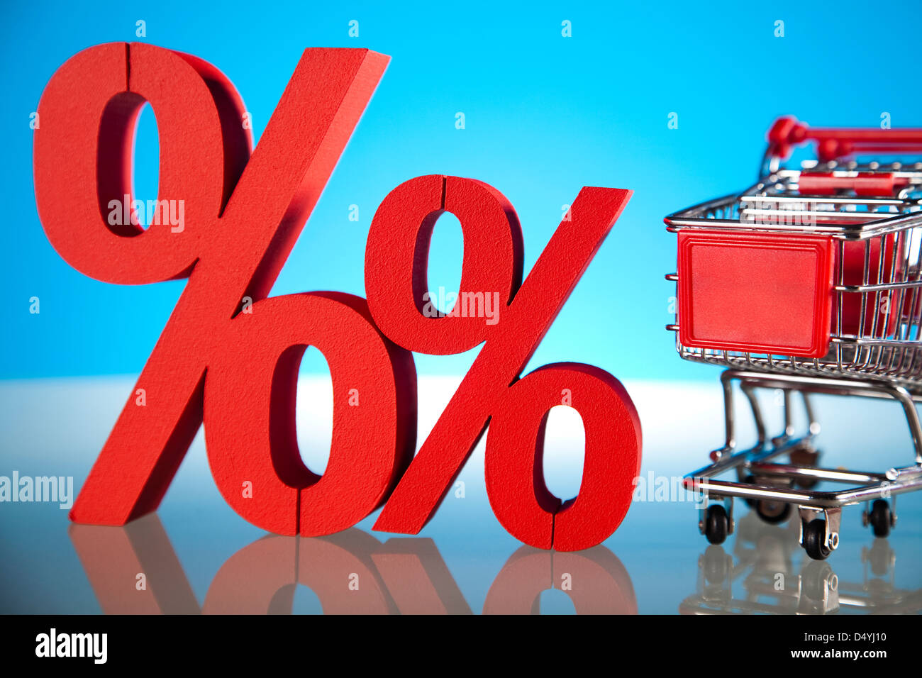 Shopping supermarket cart, percent sign Stock Photo - Alamy