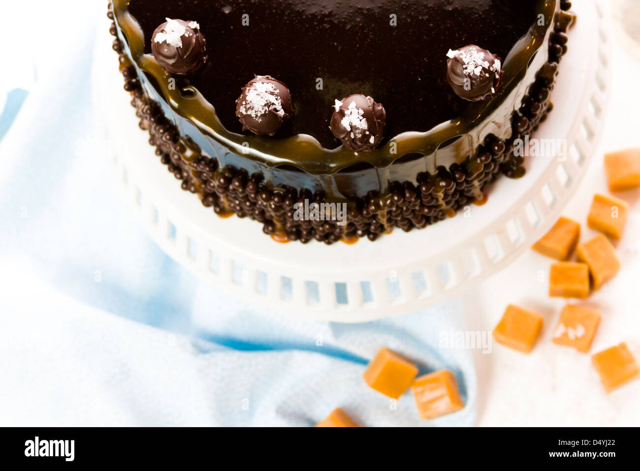 Salted caramel truffle torte with layers of chocolate cake filled with ...