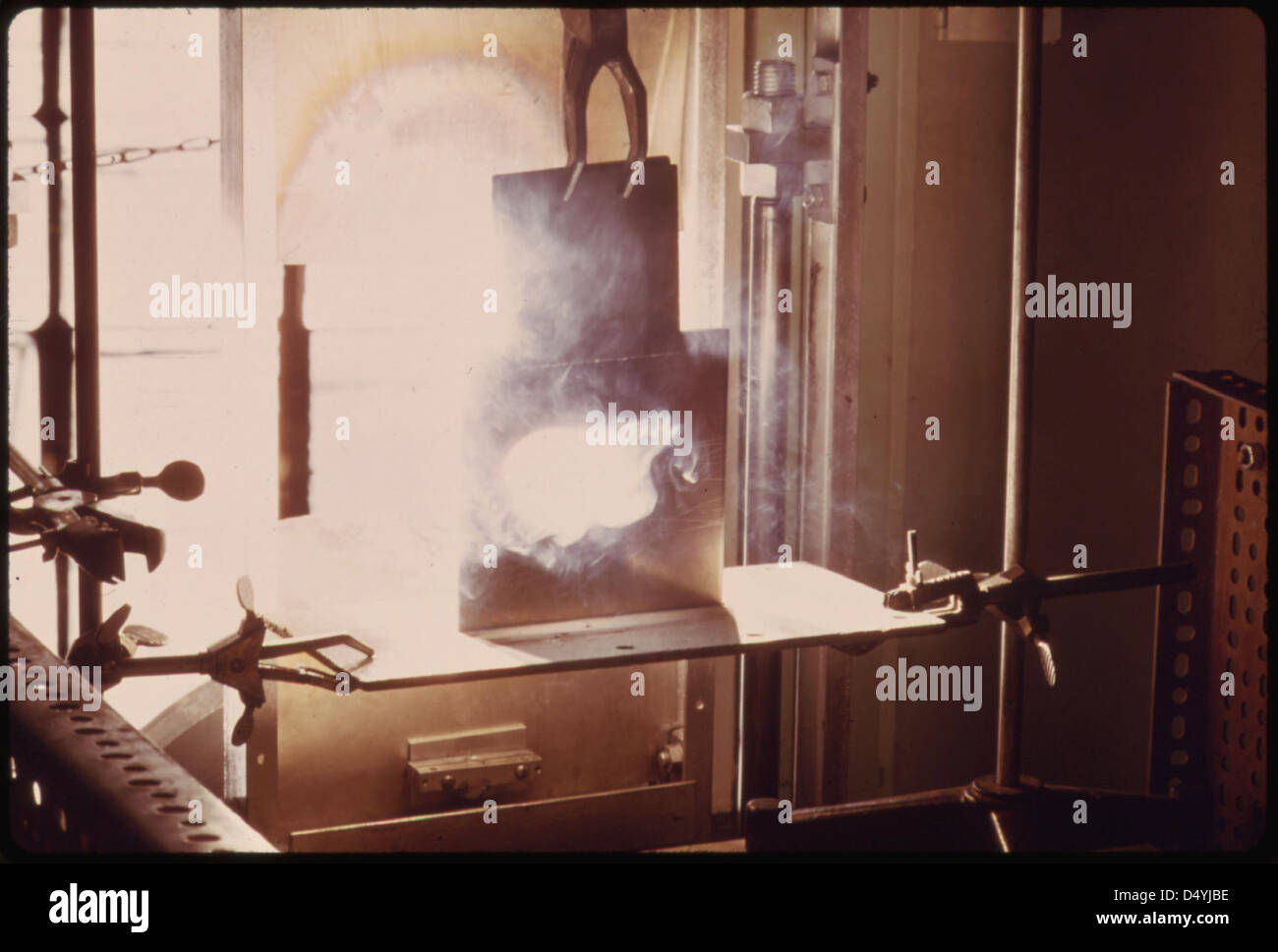 This 1974 photo shows a time sequence of an aluminum plate melting due ...