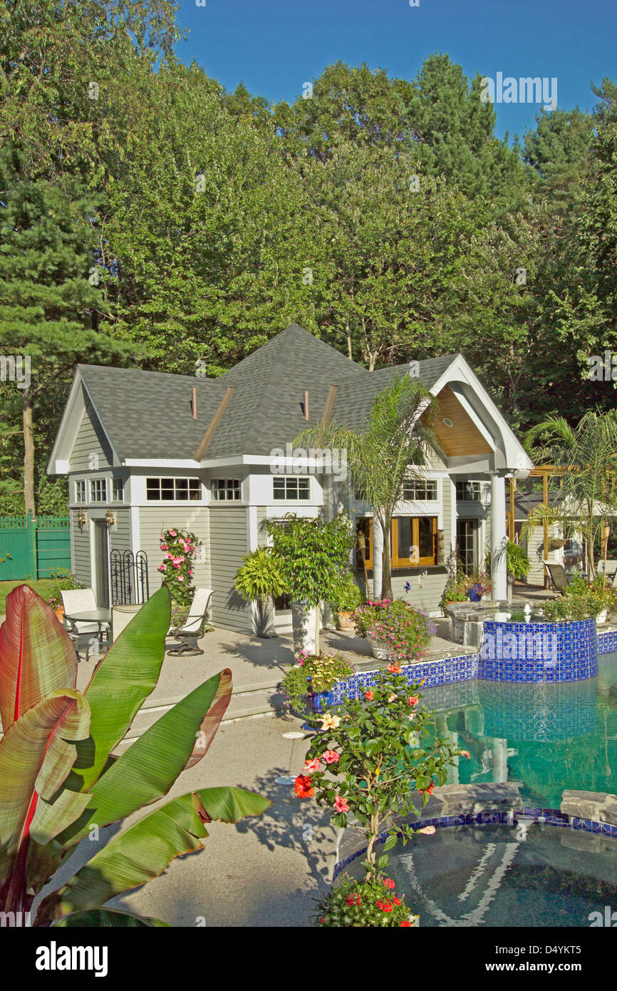 Swimming pool in front of pool house Stock Photo - Alamy