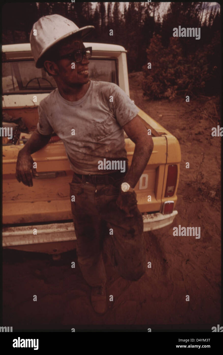 A photograph from September 1973 showing a 'cat skinner' working in the ...