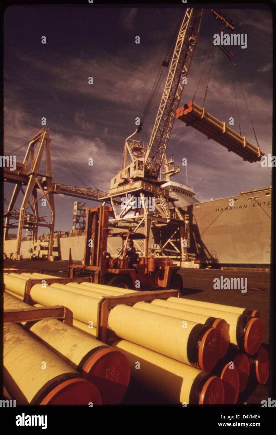 In October 1973, pipes are unloaded from a Matson Lines ocean liner in ...