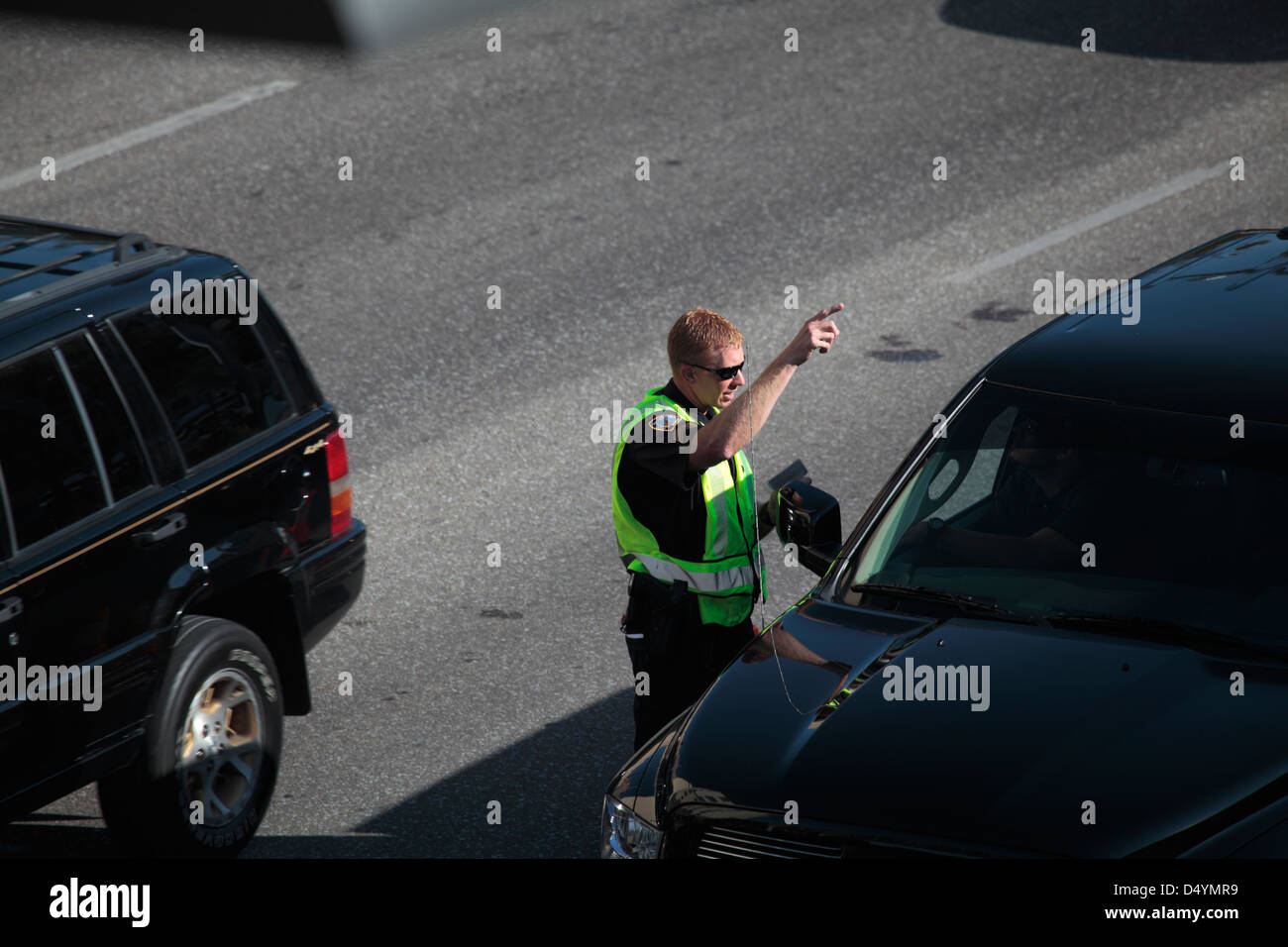 Police officer giving directions Stock Photo - Alamy Police officer giving directions Stock Photo - Alamy