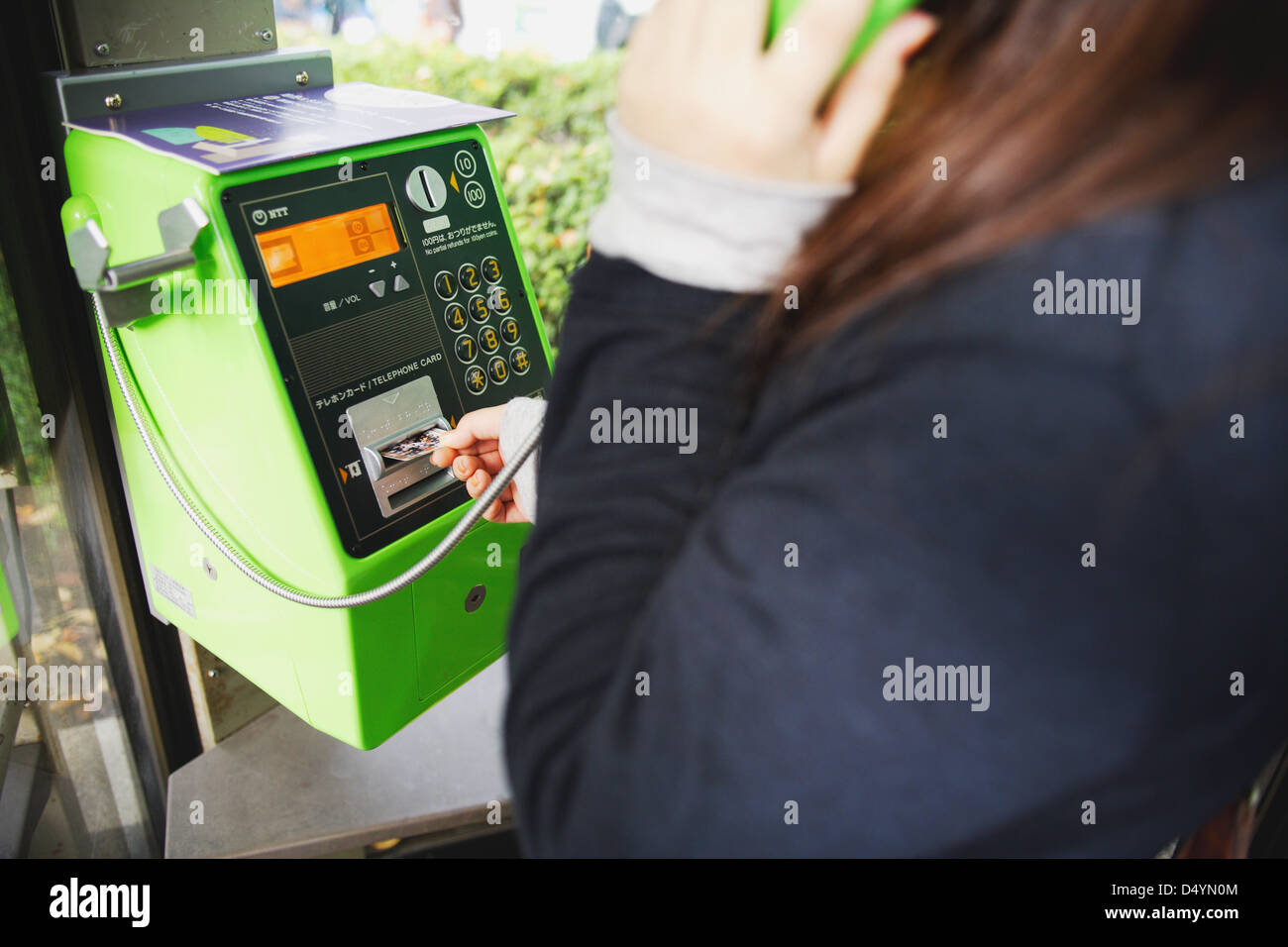 Green public telephone japan hi-res stock photography and images - Alamy