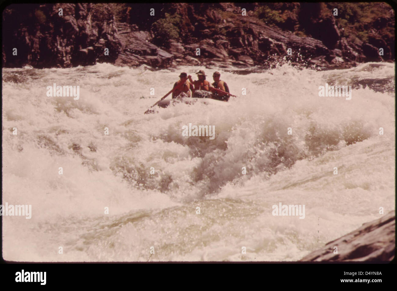 A 17-foot raft navigates the Wild Sheep Rapids on the Snake River in ...