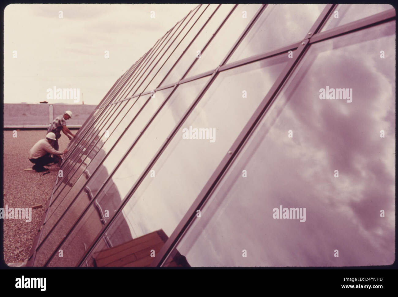 This May 1975 photo shows flat plate solar heating collectors installed ...