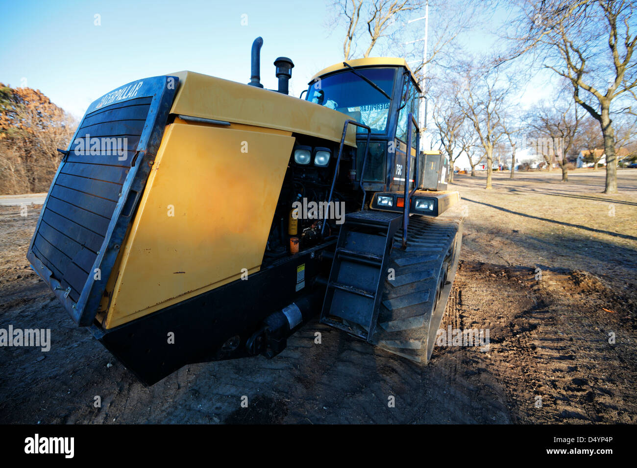 Front of a yellow Caterpillar 75C Challenger Crawler tractor Stock ...